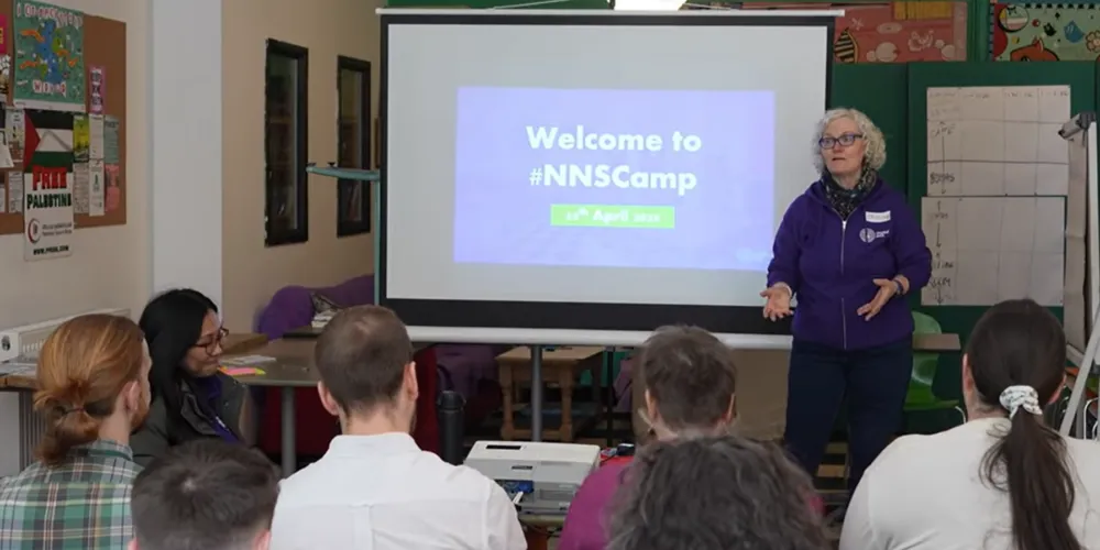 Pauline introduces people to NSS Camp.